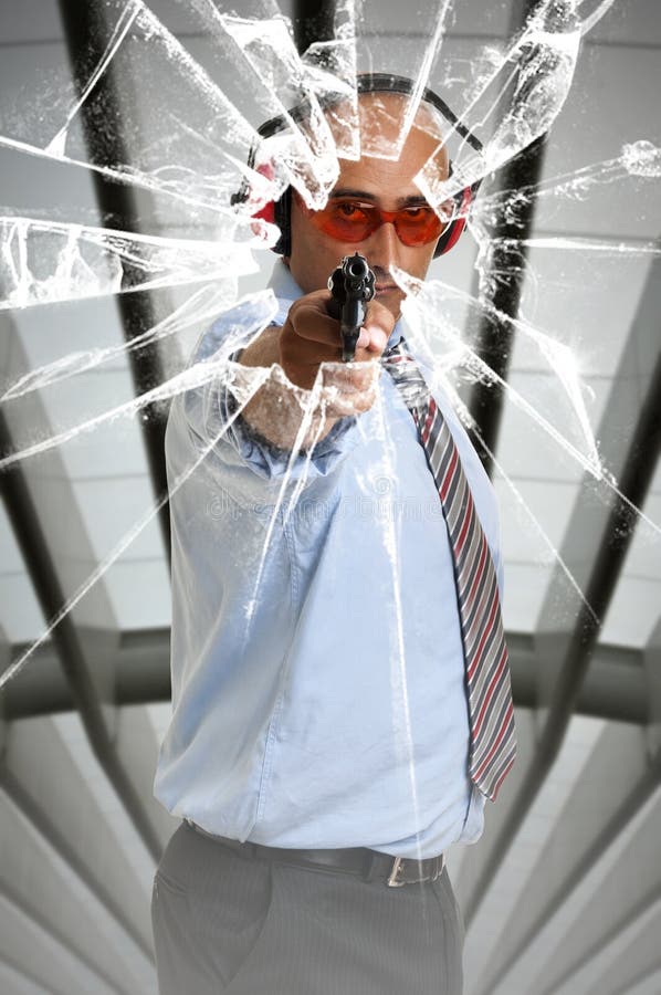 Man pointing a gun. stock photo. Image of glock, officer - 11759064