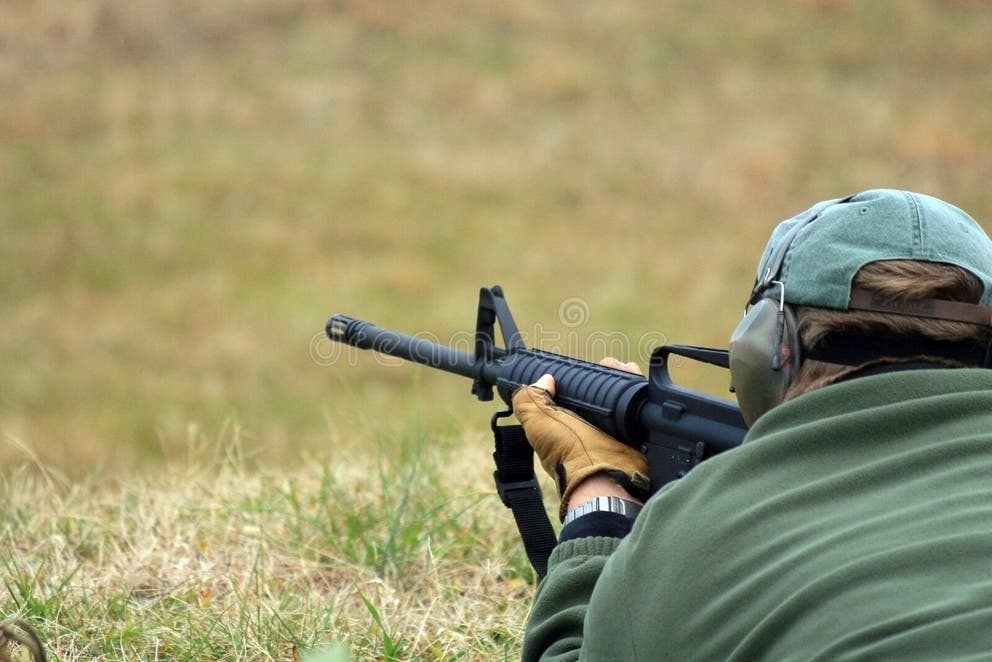 Shooter Aiming Down Range stock photo. Image of fired - 2322252