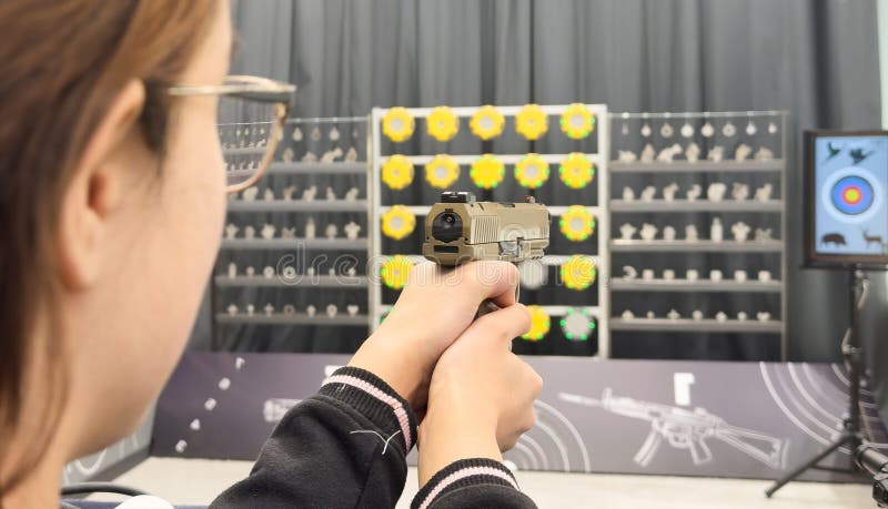 Shooters Practicing Tactical Shooting in a Modern Indoor Gun Range ...