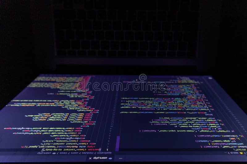 The Screen Of The Program Source Code On The Laptop Placed On The Desk Which The Programmer Has