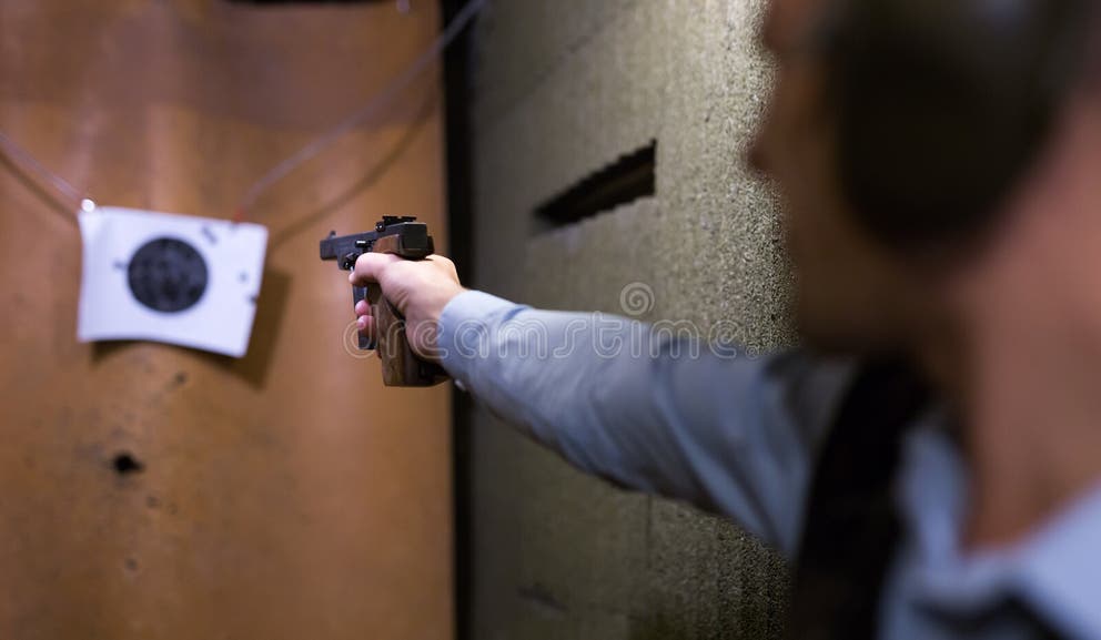 Shooting a Combat Pistol in Shooting Range Stock Image - Image of ...