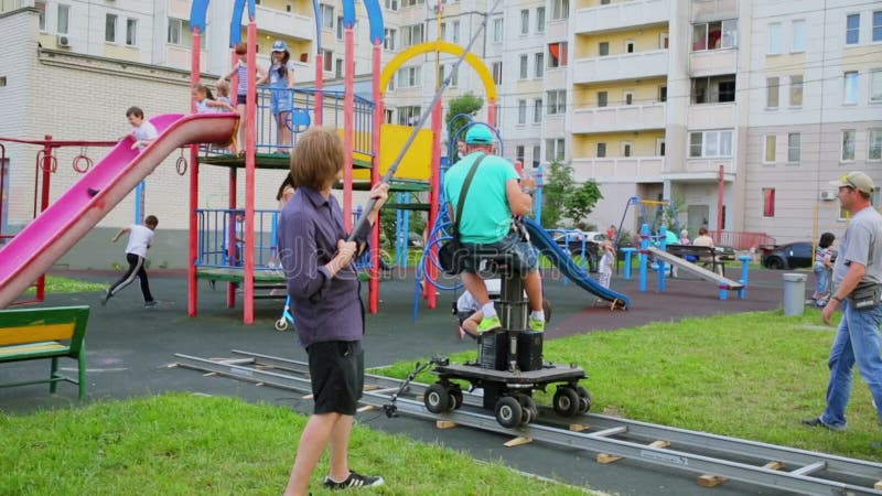 Shooting Crew Work on Playground with Children at Stock Footage - Video ...