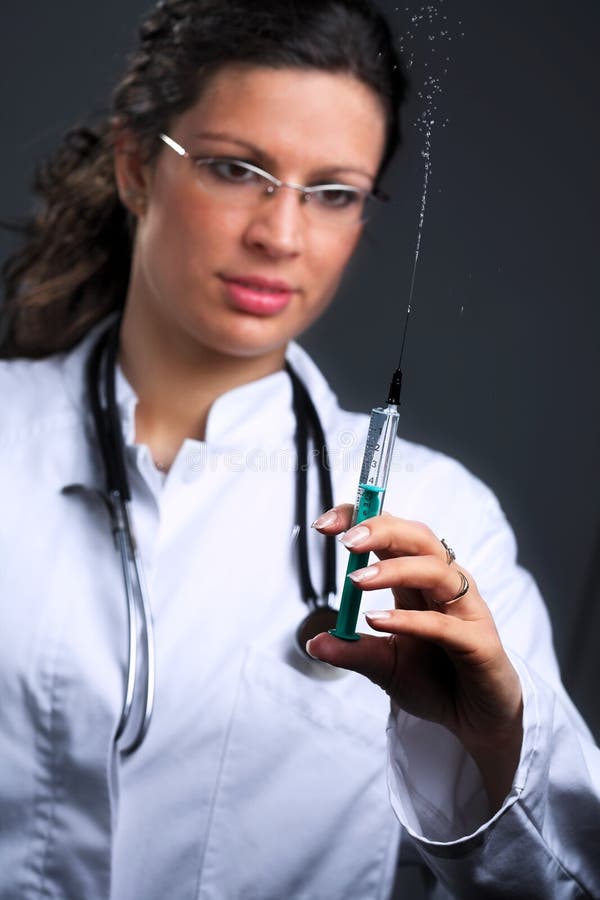 Shooting an injection stock photo. Image of healthcare - 1911088