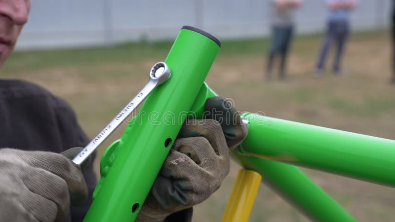 Shooting about Man Assembling Metal Playground for Kids Stock Video ...