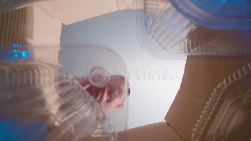 Man Taking Out Plastic Trash for Recycling, Bottom View Stock Video ...