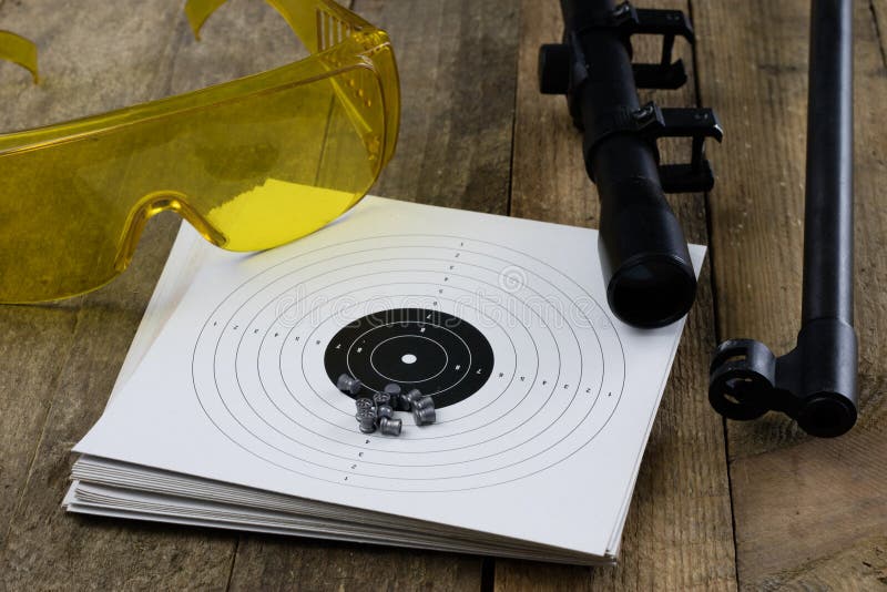 Shooting and Pneumatic Weapon. Shield and Hits with Lead Bullets Stock ...