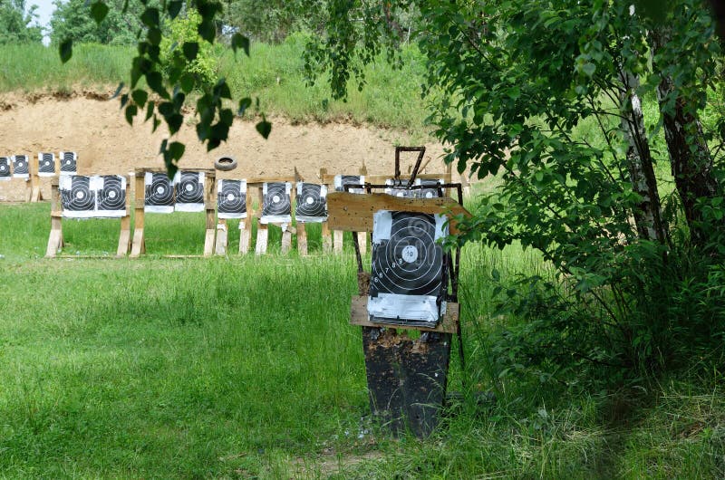 Shooting with Gun at Target in Shooting Range. Man Practicing Fire ...
