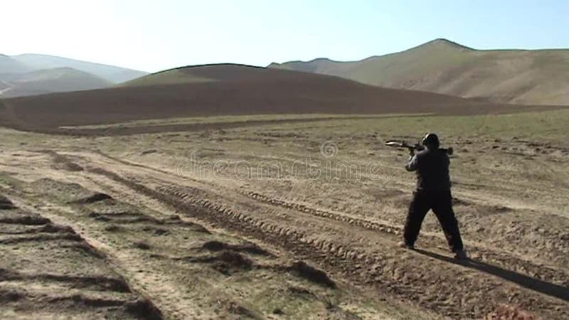 Shooting an RPG stock video. Video of explosion, mrap - 110090787