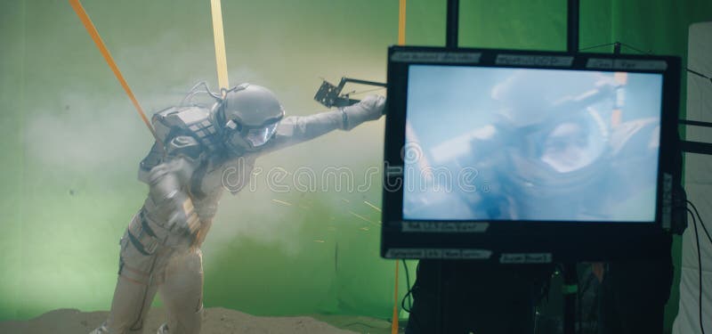 Shooting a Scene with an Astronaut Struggling Against the Wind Stock ...