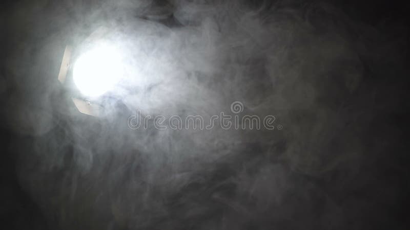 Shooting of Spotlight in White Clouds of Smoke Stock Footage - Video of ...