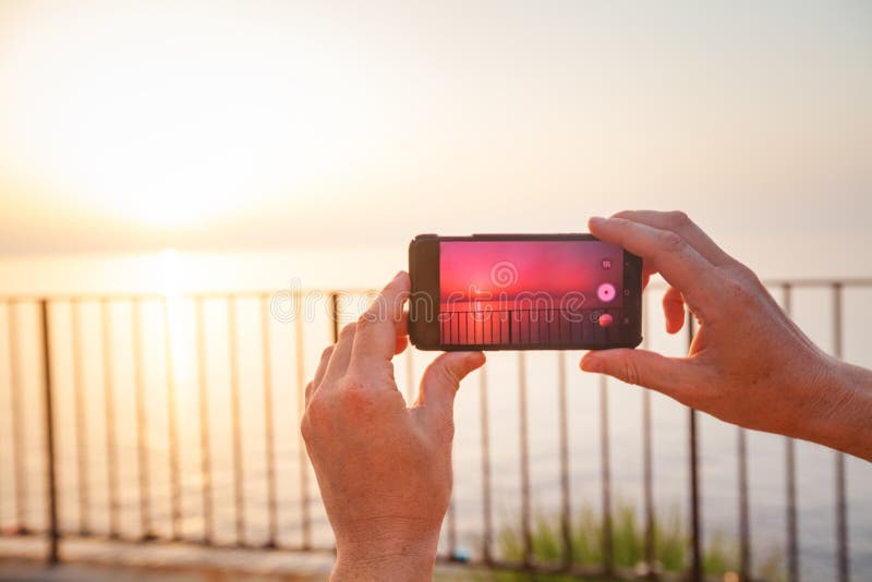 Shooting a Stunning Sunset with a Smartphone Camera Stock Image - Image ...