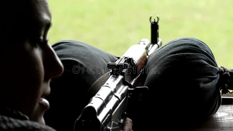 Shoots with a Machine Gun in Slow Motion. Stock Video - Video of male ...