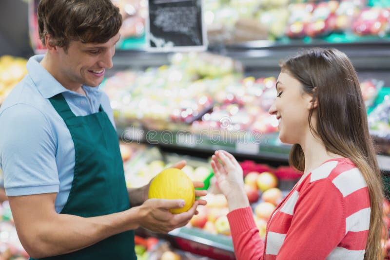 Shop Assistant Giving Advises To a Customer Stock Photo - Image of ...
