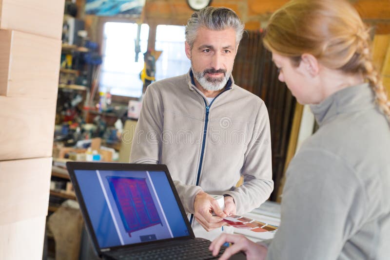 Shop Assistant Researching Customers Paint References on Computer Stock ...