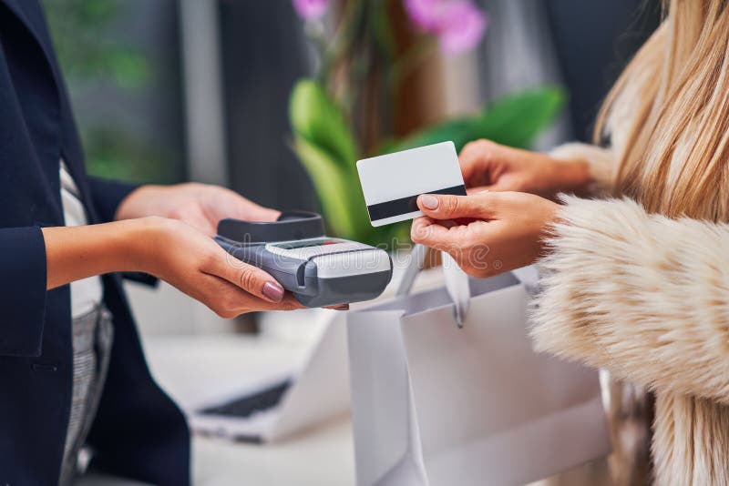 Shop Assistant Serving the Customer in Store Stock Image - Image of ...