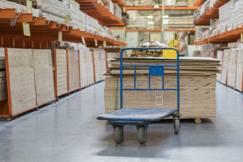 Shop of Building Materials. Racks with Boards, Wood and Building ...