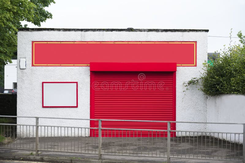 Shop Front with Blank Sign and Closed Shutter Door Stock Image - Image ...