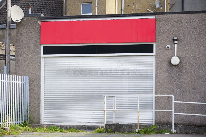 Shop Front with Blank Sign and Closed Shutter Door Stock Image - Image ...