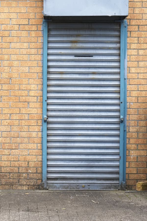 Shop Front with Blank Sign and Closed Shutter Door Stock Image - Image ...