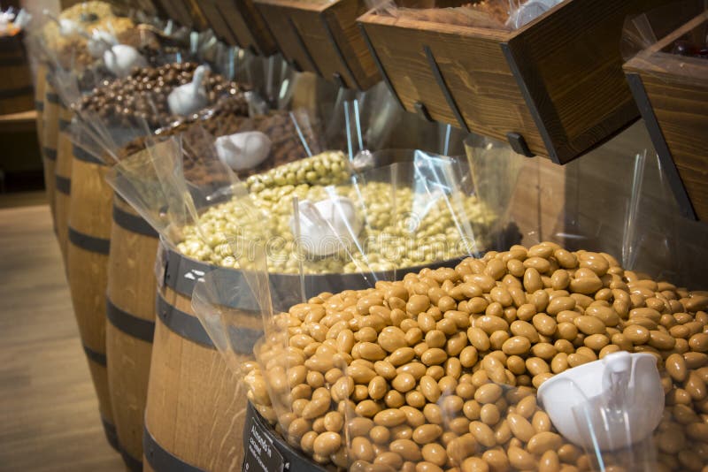 Shop with Kegs of Sweets and Sweets Peanuts in Chocolate Stock Photo ...