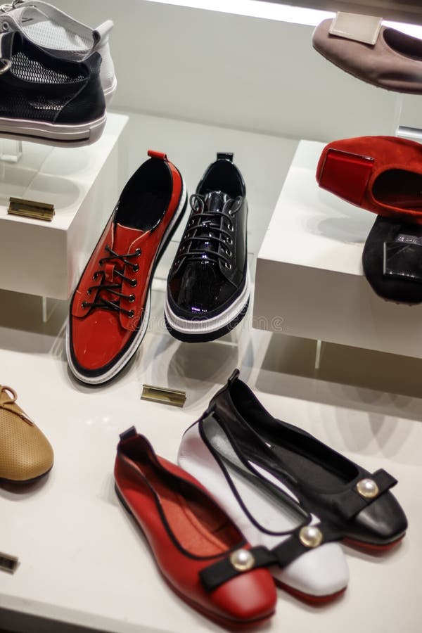 Shop Shelves with Multi-colored Shoes Stock Photo - Image of shoe, sale ...