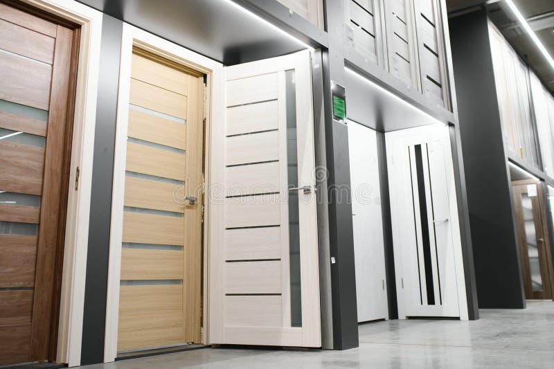 Shop Window of Doors. a Large Selection of Doors for House Stock Photo ...