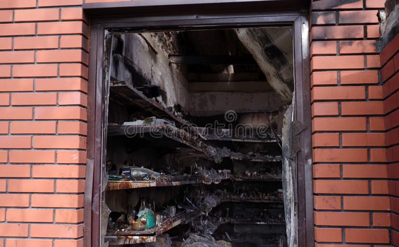 Shop Windows after the Fire. View through the Window of a Small Store ...