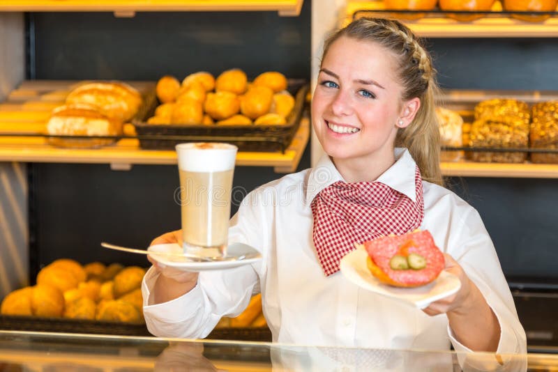 Shopkeeper at Bakery Working at Cash Register Stock Photo - Image of ...