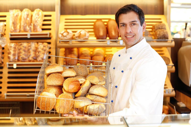 Baker with Basket Full of Bread in a Bakery Stock Image - Image of ...