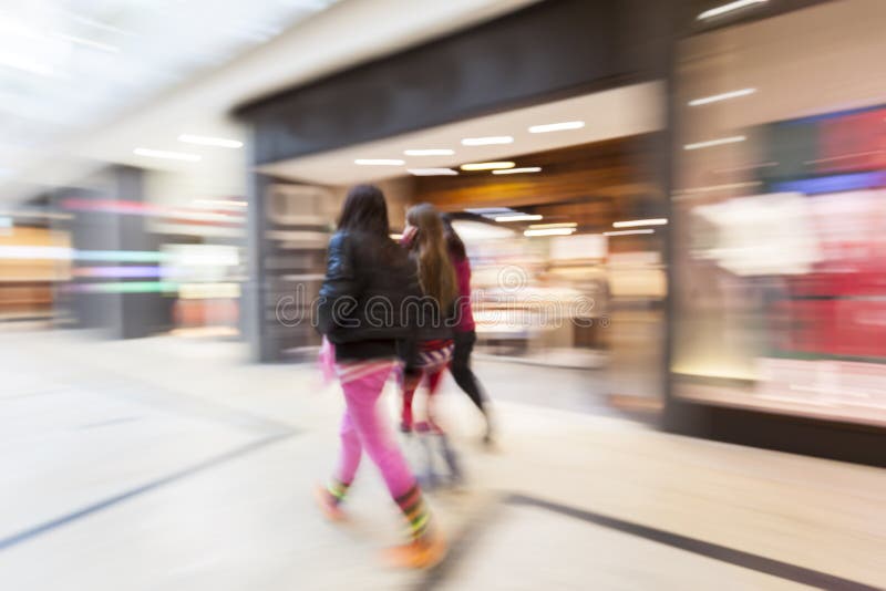 Shopper Walking in Front of Shop Window Editorial Photo - Image of ...