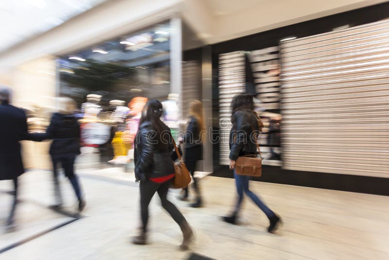 Shopper Walking In Front Of Shop Window Editorial Stock Photo - Image ...