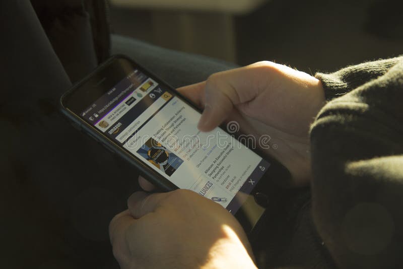 Shopping on Amazon with a Mobile Phone Editorial Photo - Image of ...