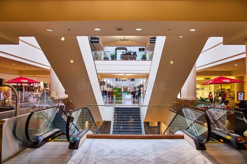 Shopping Area with Dual Escalators and Stairs in between in Symmetrical ...