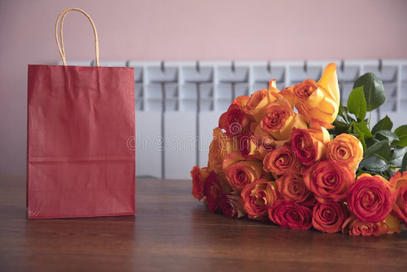 Shopping bag and roses stock image. Image of flower - 184513817