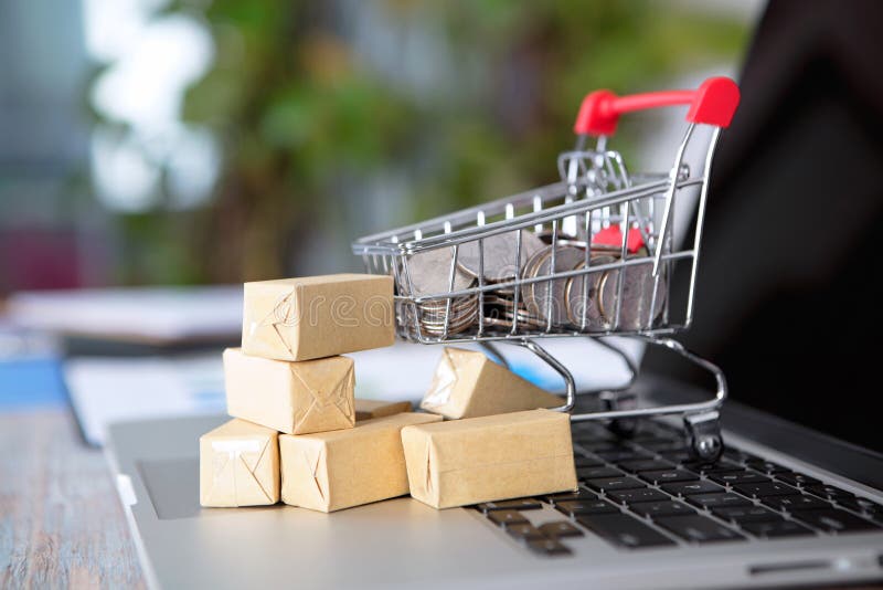 Shopping Cart Model and Express Cargo Model on Laptop Stock Image ...