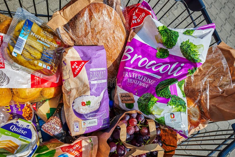 Shopping Cart with Various Products for daily Needs Editorial ...