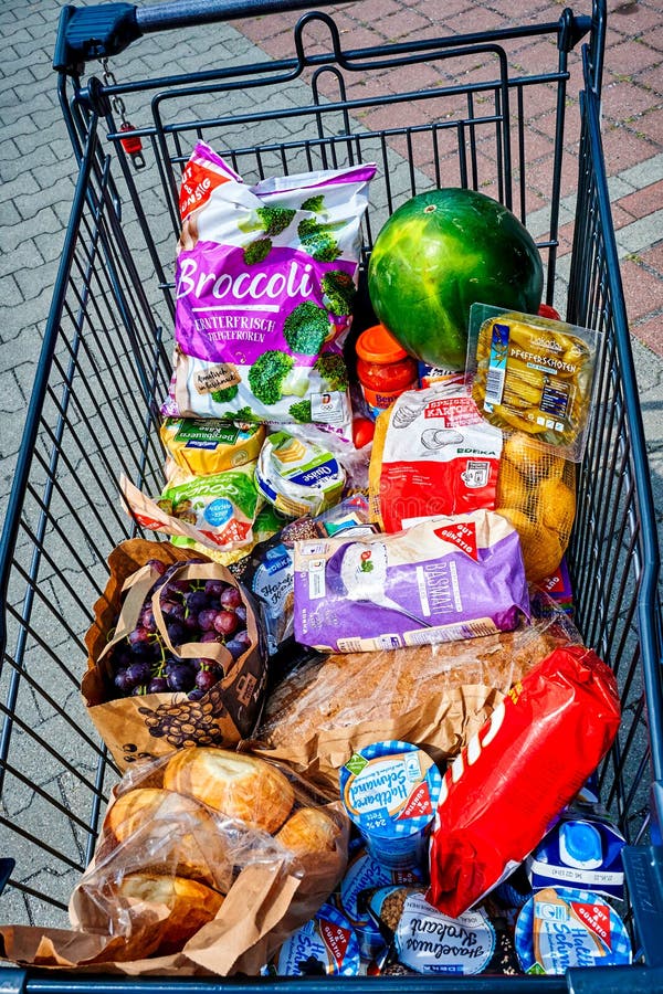 Shopping Cart with Various Products for daily Needs Editorial Photo ...