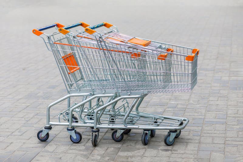 Shopping Carts Lined Up on a Concrete Surface Stock Image - Image of ...
