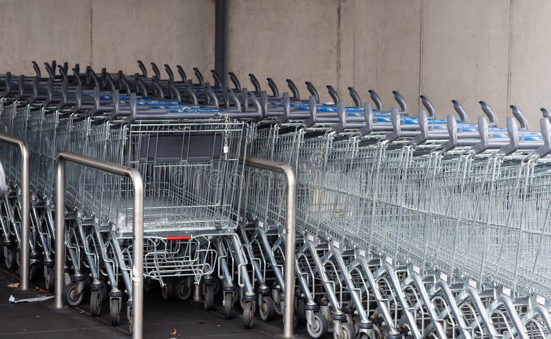 Shopping carts in row stock image. Image of discount - 237664999