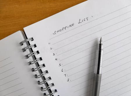 Shopping list and pen stock photo. Image of spending - 12546750