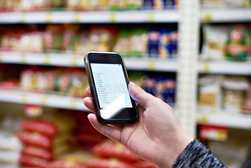 Shopping List on Smartphone Screen in Hand of Women Customers Stock ...