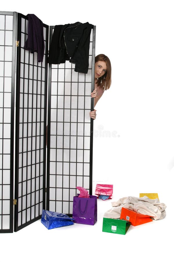Shopping Teen Peeking From Behind A Screen Picture. Image: 9909731