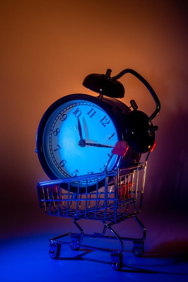 Shopping Time Concept - Cart and Clock or Hourglass. Creative Lighting ...
