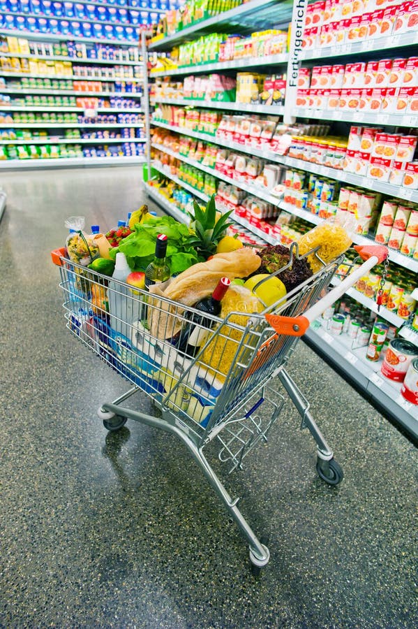 Shopping Trolley in a Supermarket Stock Image - Image of shopping, food ...