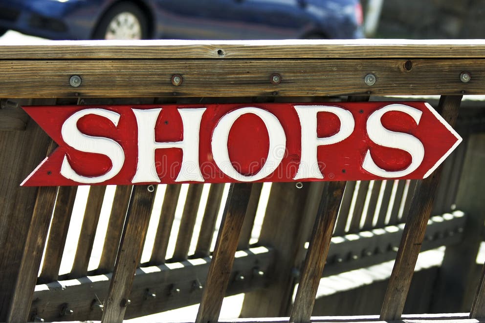 Shops Arrow Sign stock image. Image of sales, city, stores - 14583207
