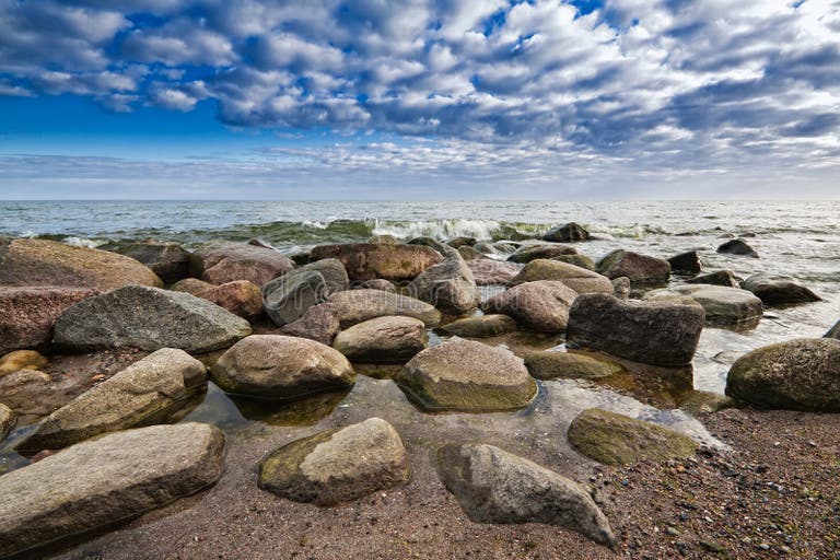 On shore stock photo. Image of waterside, waves, rocks - 22962966
