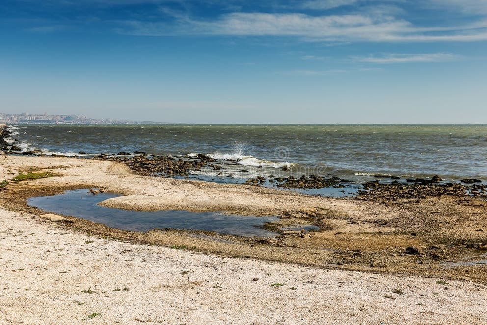 Shore of the Caspian Sea with Pebbles and Waves. Stock Photo - Image of ...