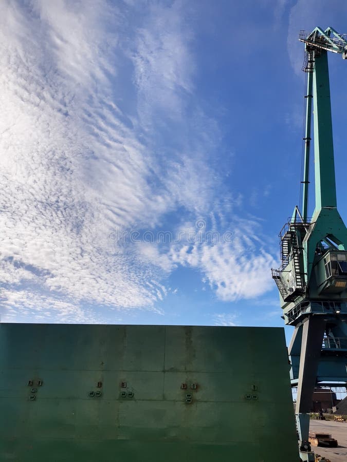 Shore Crane Loading Containers in Freight Ship. Stock Photo - Image of ...
