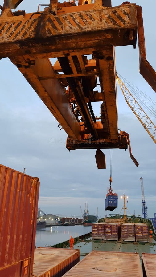 Shore Crane Loading Containers in Freight Ship Stock Image - Image of ...
