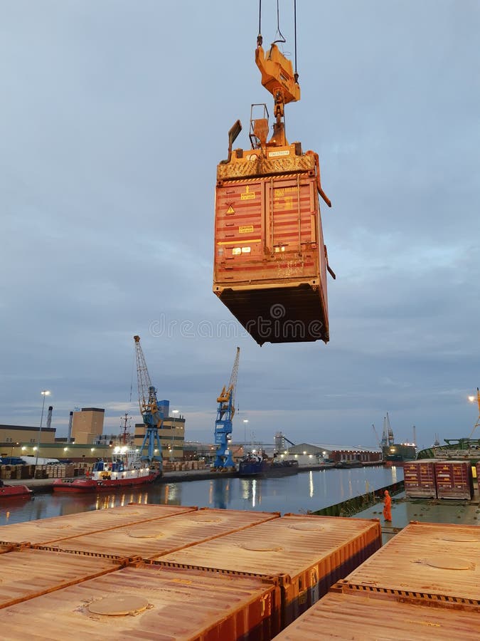 Shore Crane Loading Containers in Freight Ship Editorial Image - Image ...